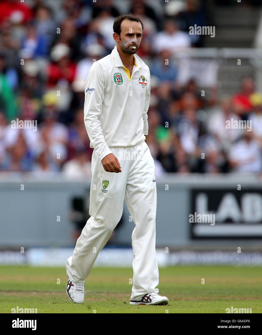 Australia's Nathan Lyon shows his dejection after he was hit for 6 by ...