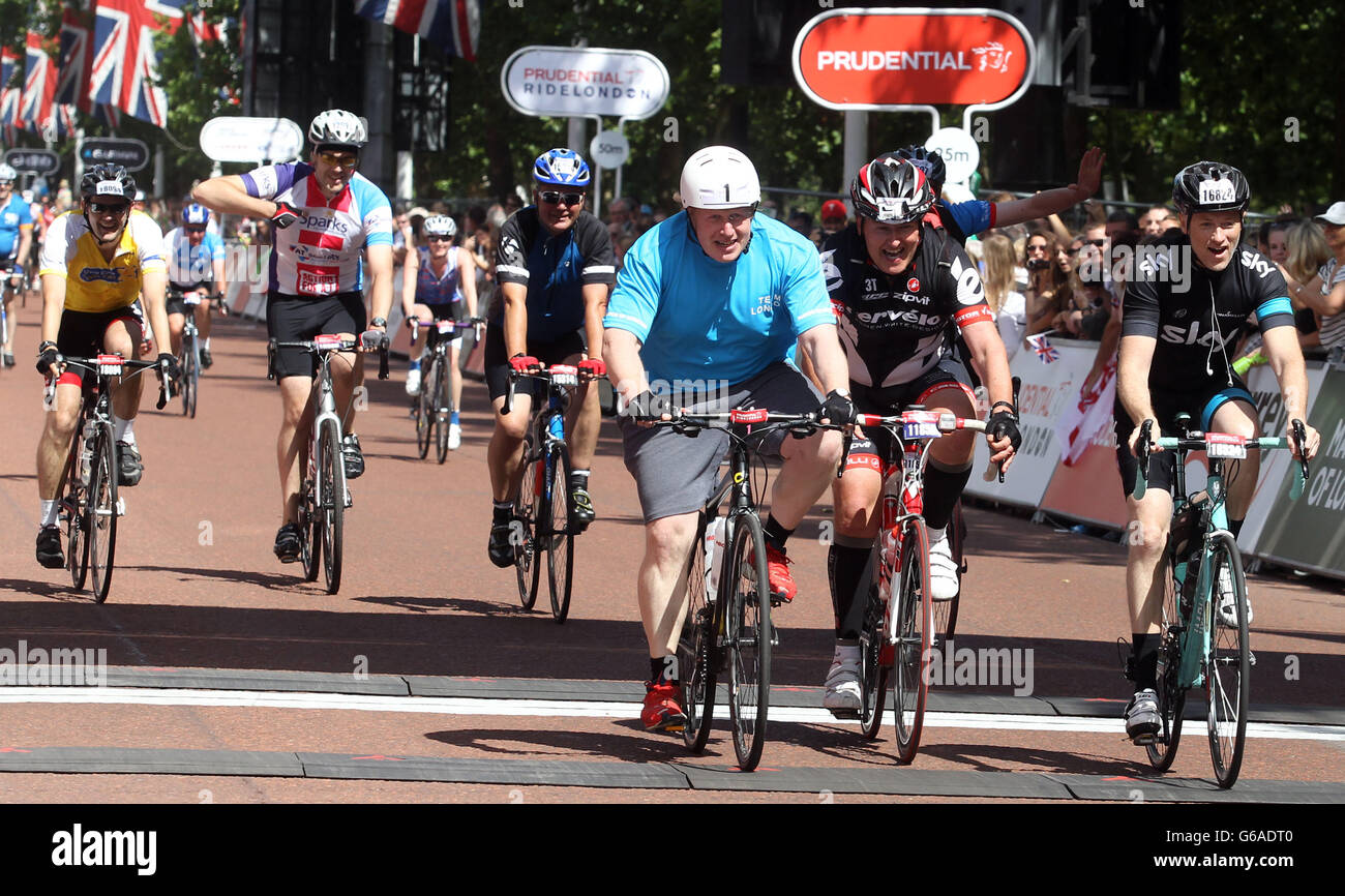 London Mayor Boris Johnson completes the Surrey 100 mile bike ride ...