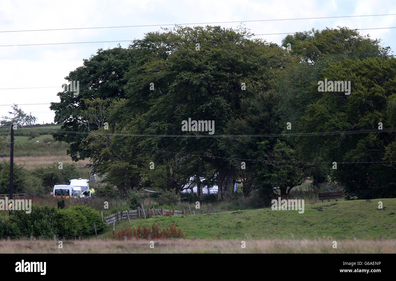 The scene where a father has been shot dead and his son wounded in a ...