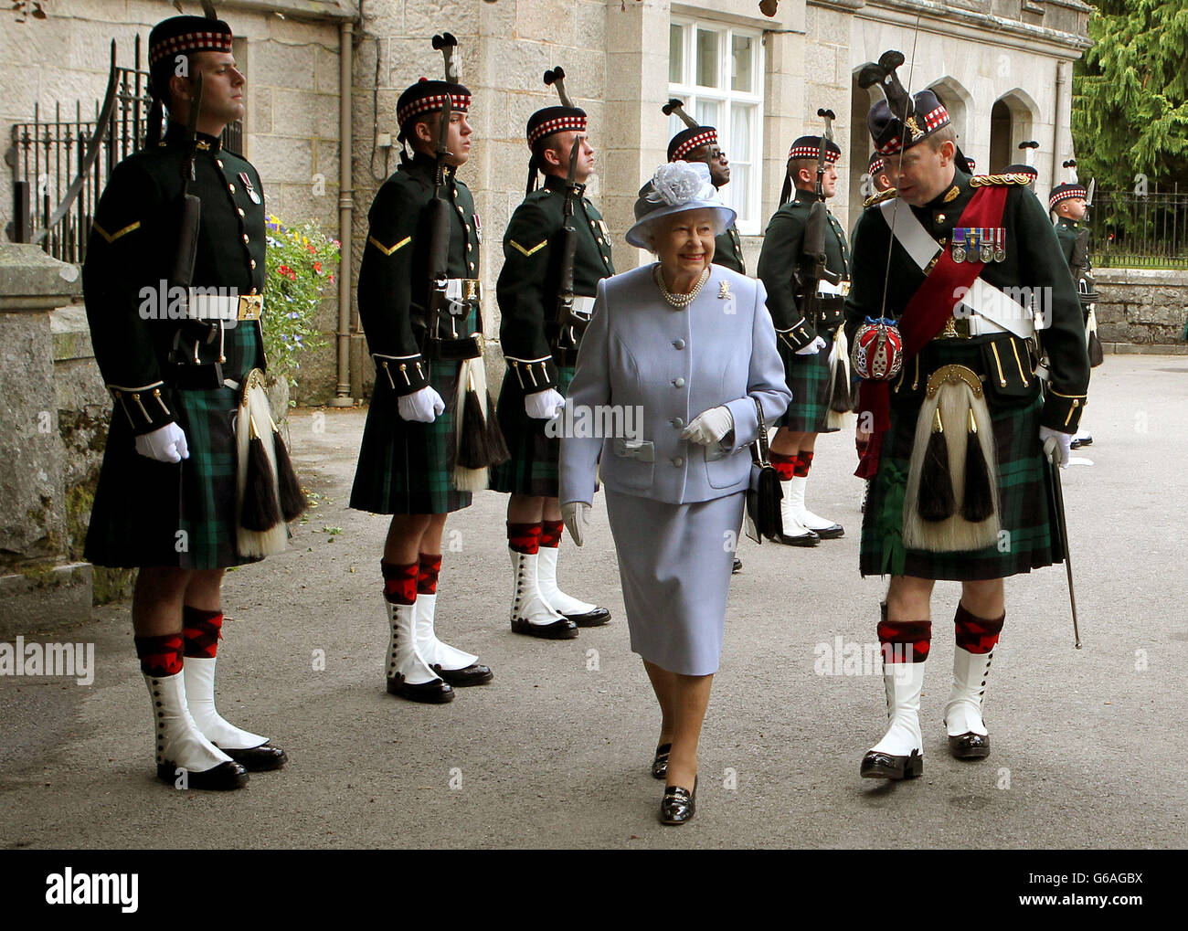 Queen Elizabeth II with Ballater Guard commanding officer Major Jules ...