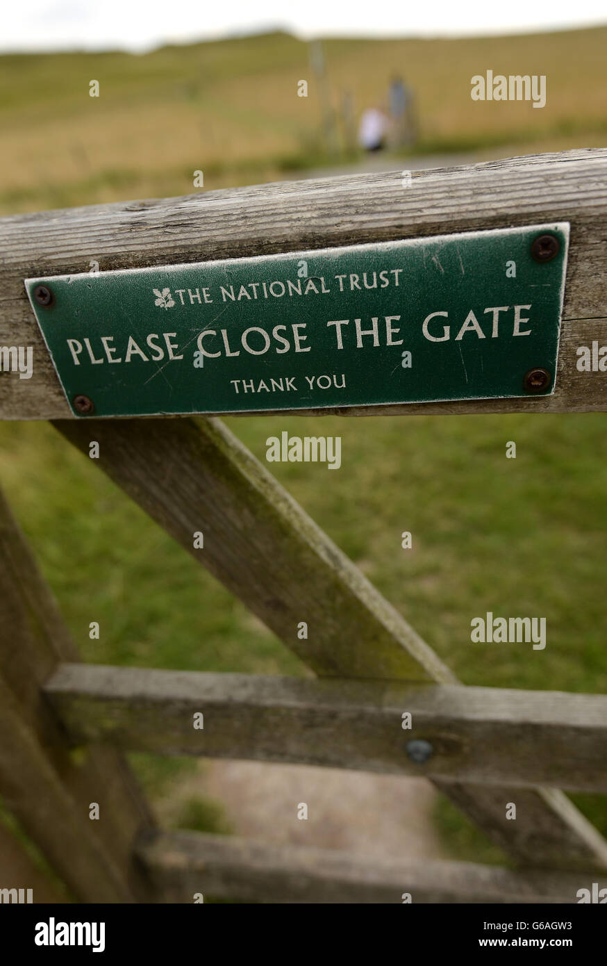 General view of a sign by The National Trust asking members of the ...
