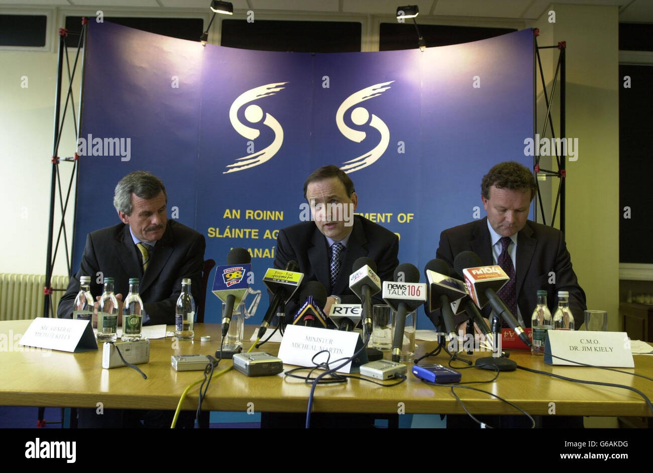 Irish Minister for Health Micheal Martin, flanked by Secretary General ...