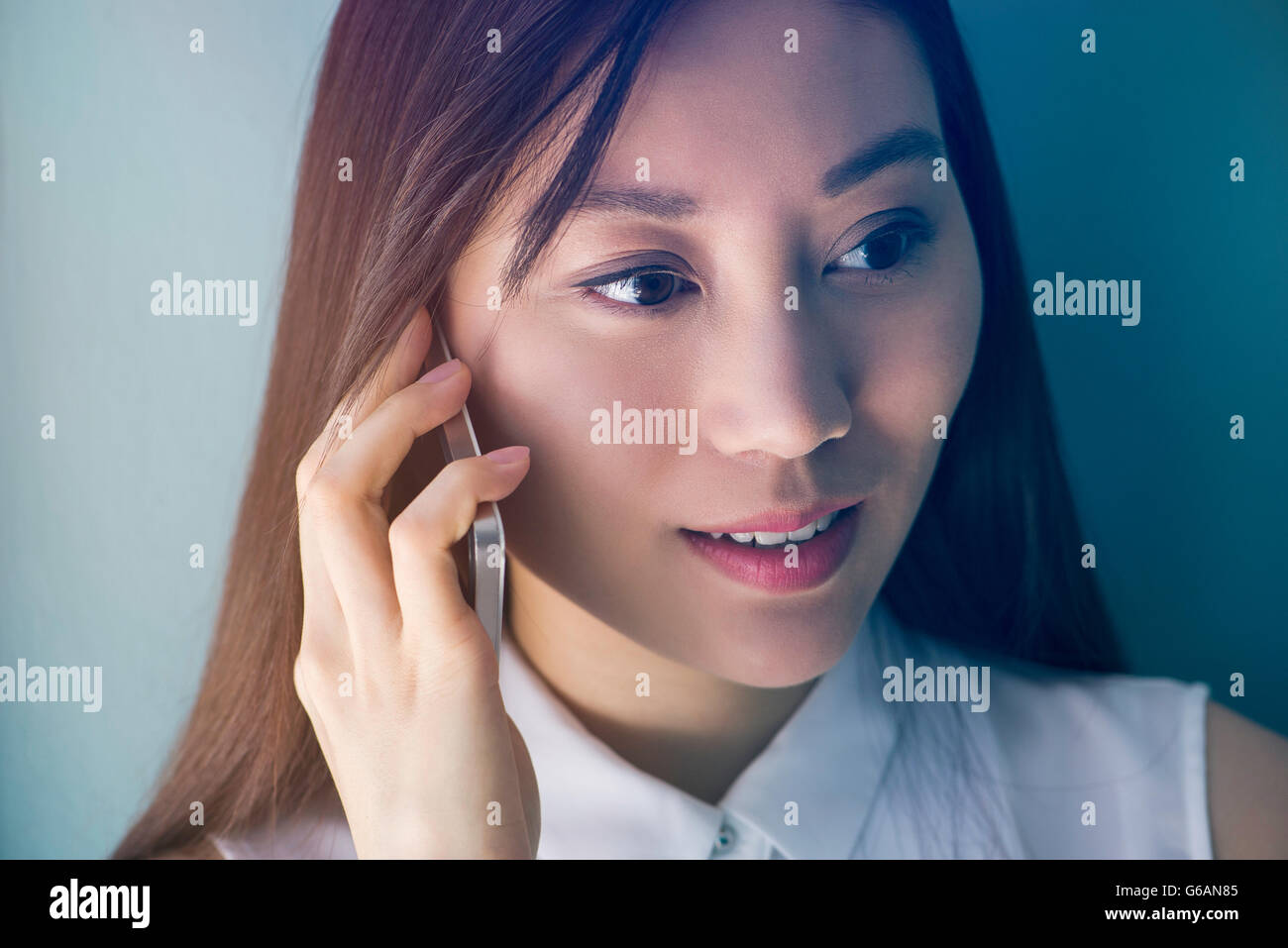 Woman talking on cell phone Stock Photo - Alamy