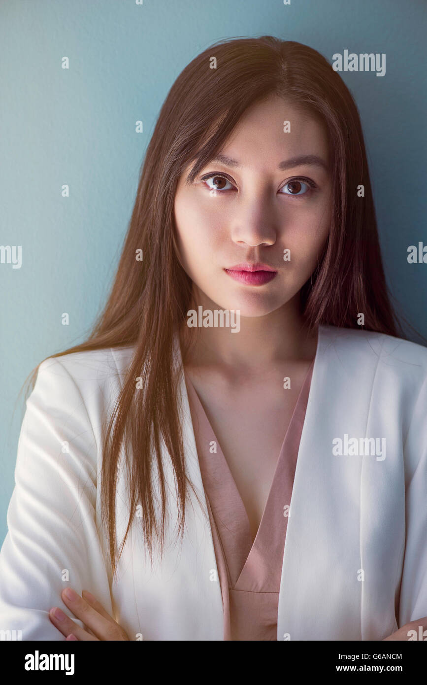 Woman with serious expression, portrait Stock Photo - Alamy