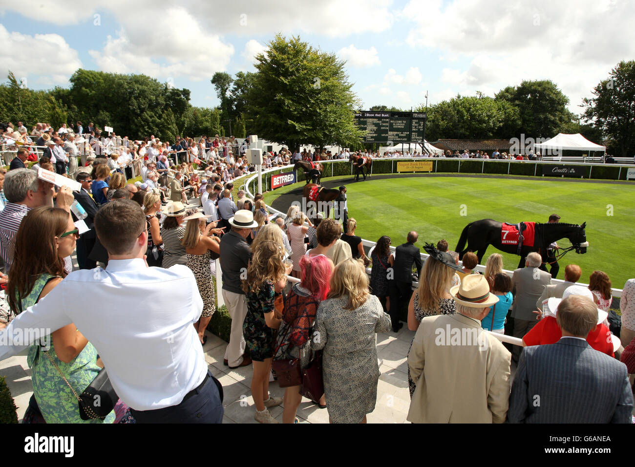 Racegoers beside the pre-parade ring during day four of the 2013 ...