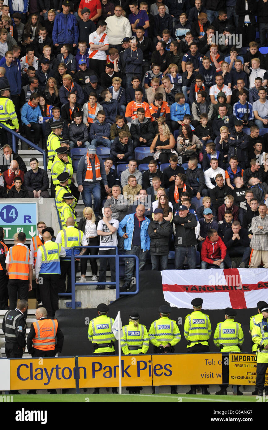 Police and stewards surround blackpool fans in the stands hi-res stock ...