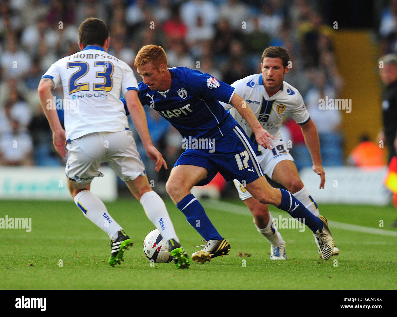 Chesterfield's Eoin Doyle (centre) and Leeds United's Zac Thompson ...