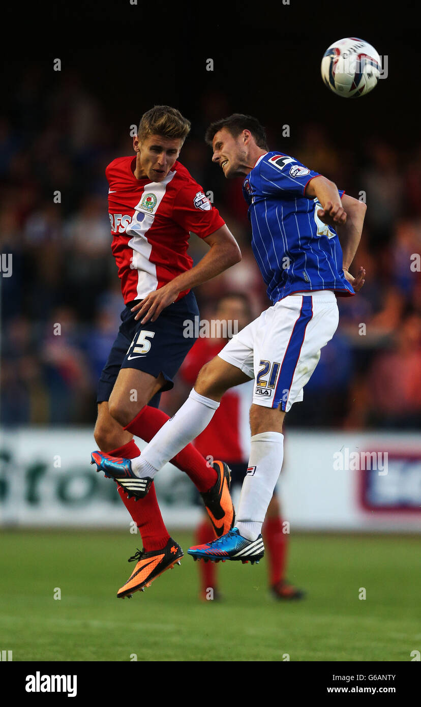 Blackburn Rover's Tom Cairney and Carlisle United's James Berrett ...