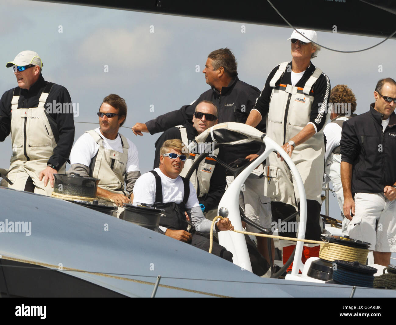 Mike Slade at the helm of his British yacht ICAP Leopard during the ...