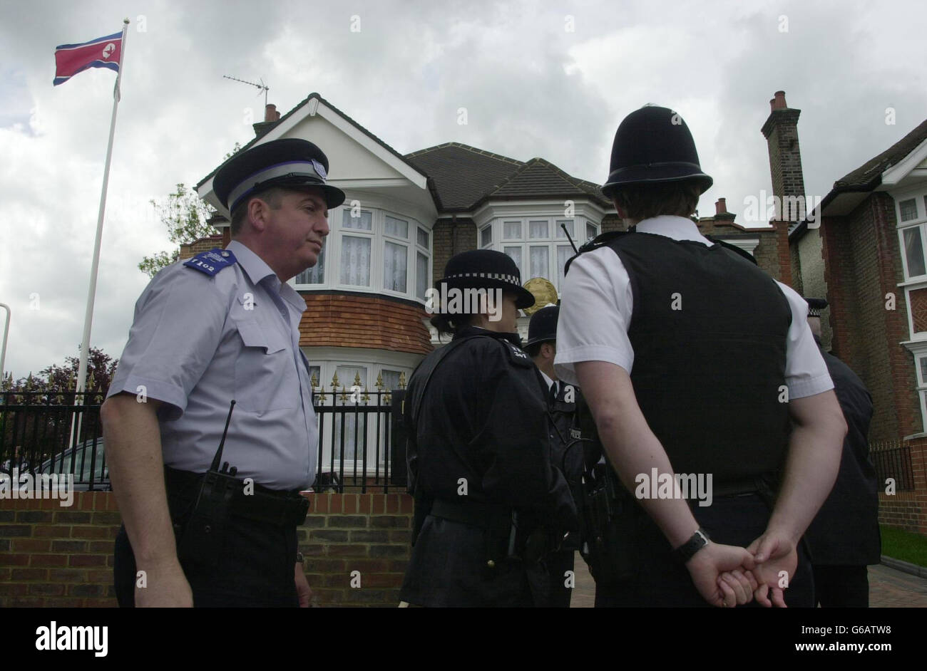 Police stand outside the first ever North Korean embassy in the UK, on ...