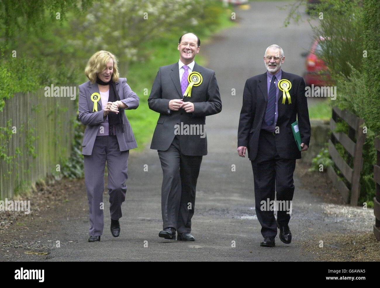 SNP leader John Swinney arrives to cast his vote at the village of ...