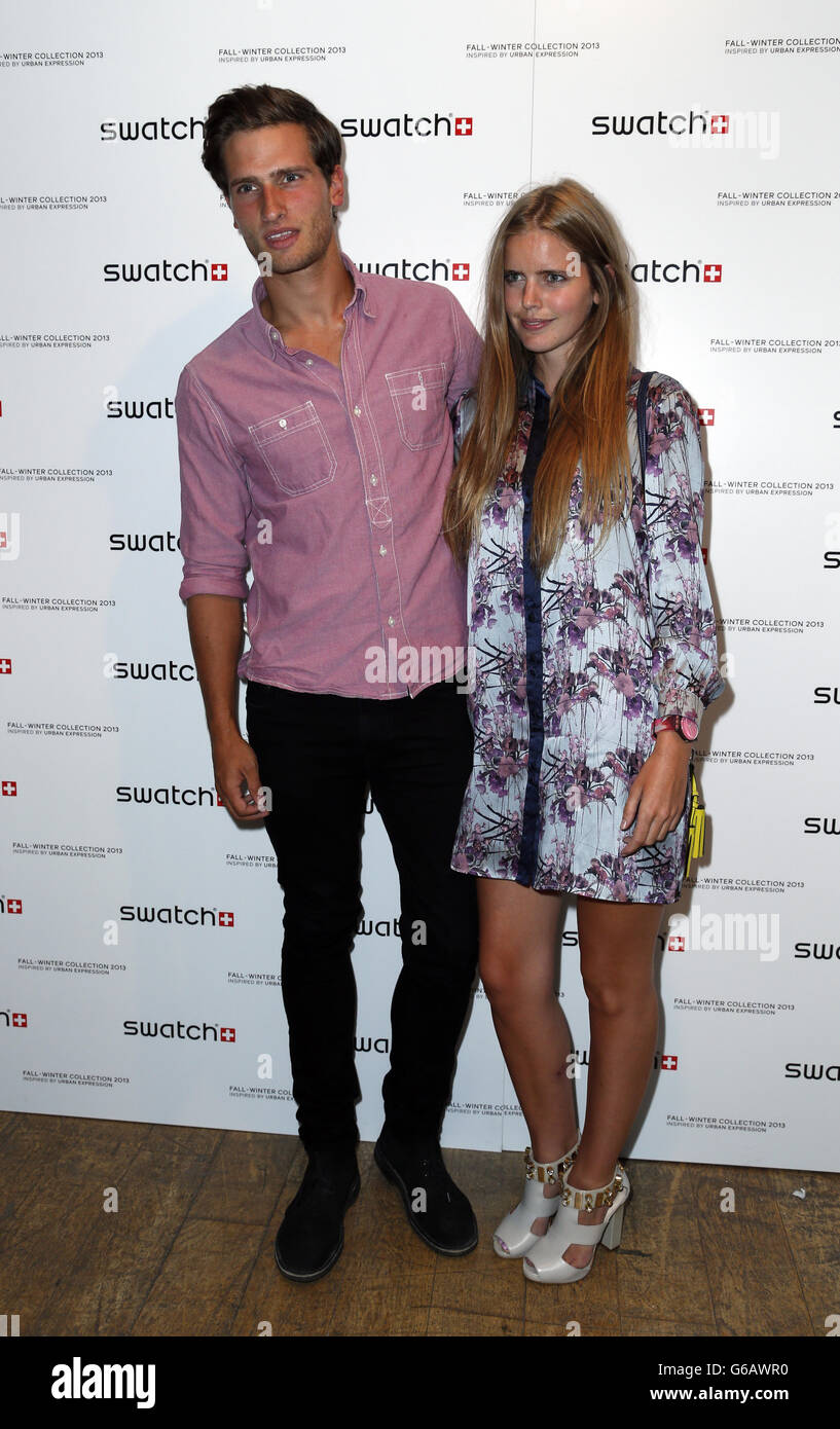 Tom Warren (left) with Katie Readman (right) arriving for the Swatch ...
