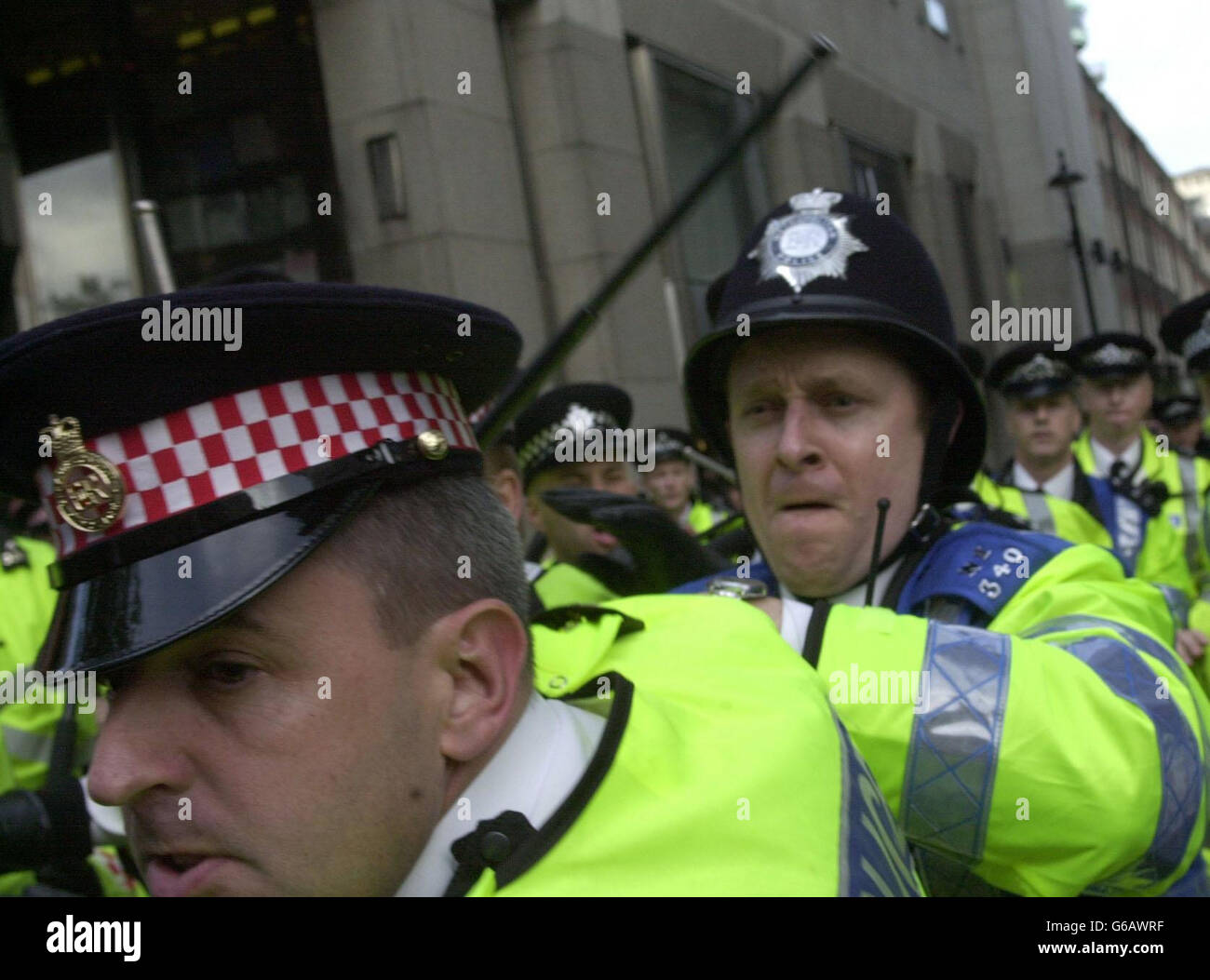 Police baton charge protesters, during a May Day demonstration in ...