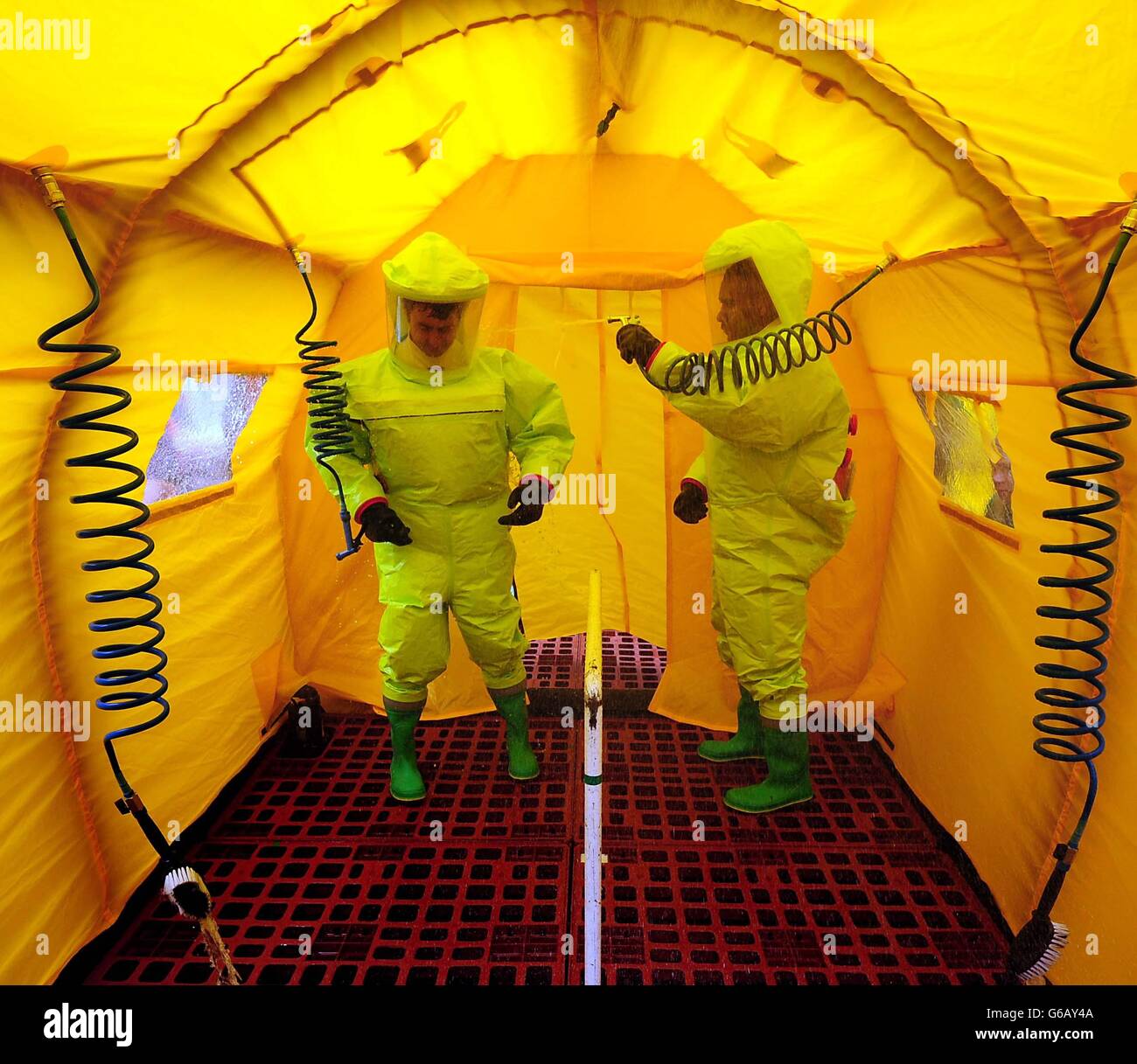 Firefighters in the decontamination tent during mock terror exercise in ...