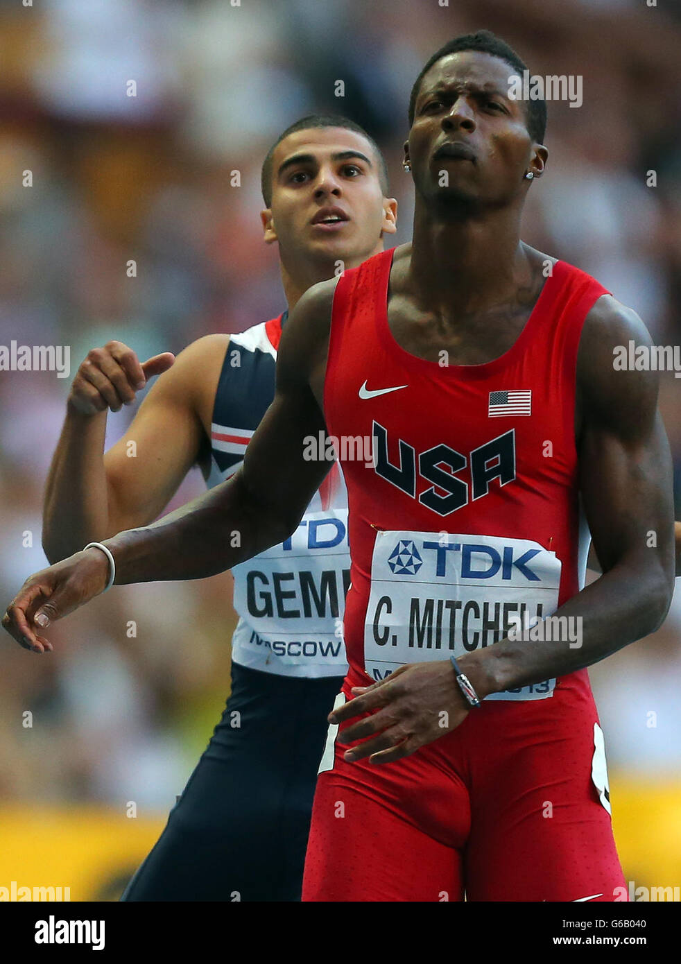 Great Britain's Adam Gemili looks at the screen as he crosses the line ...