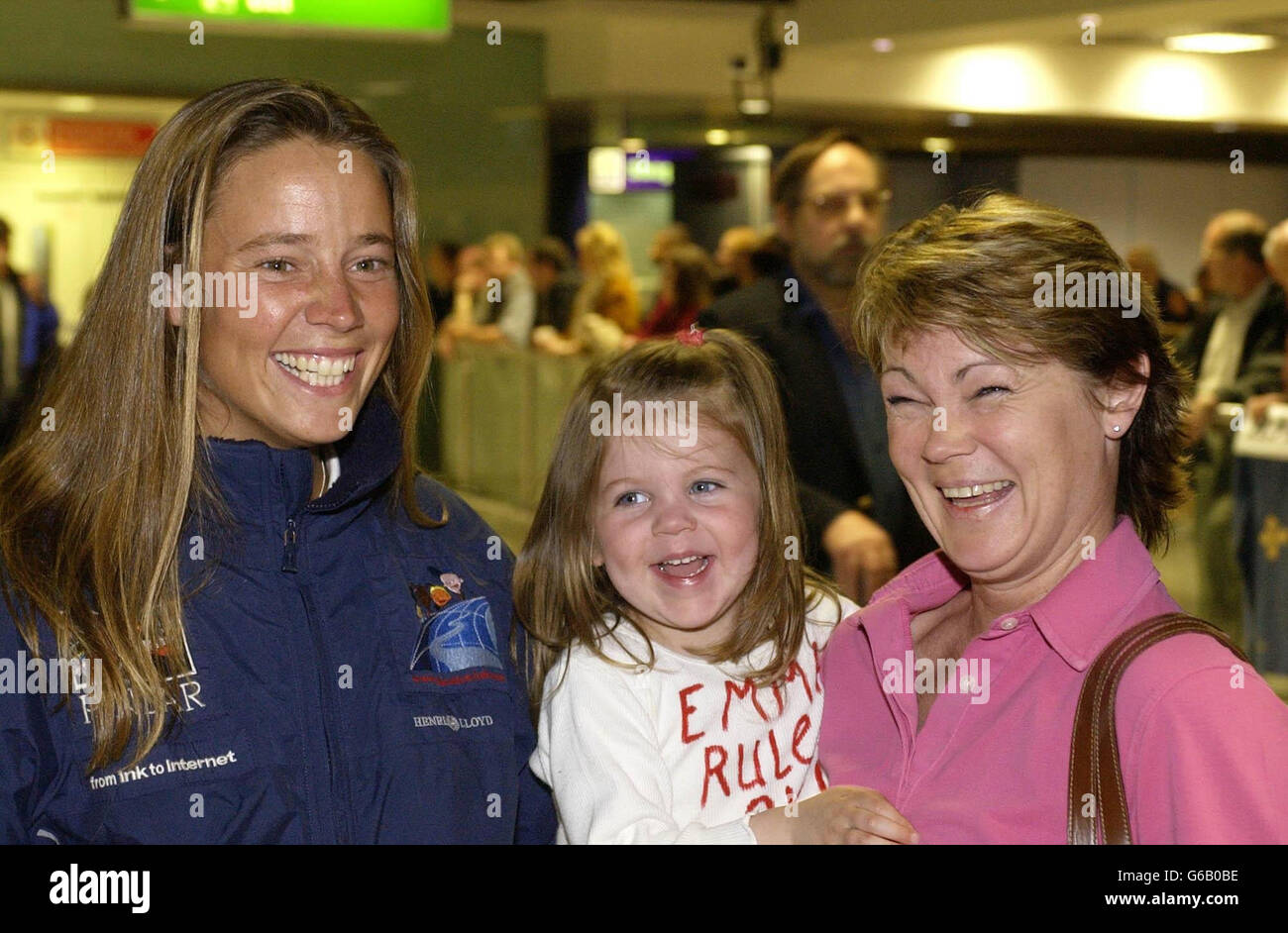 Emma Richards, 28 (left), from the Isle of Wight, is welcomed by fellow ...