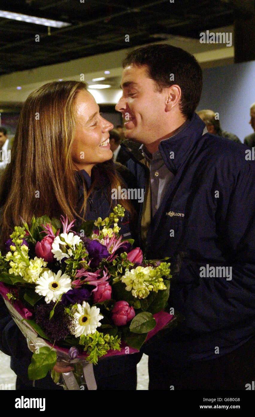 Emma Richards, 28, from the Isle of Wight, is welcomed by ber brother ...