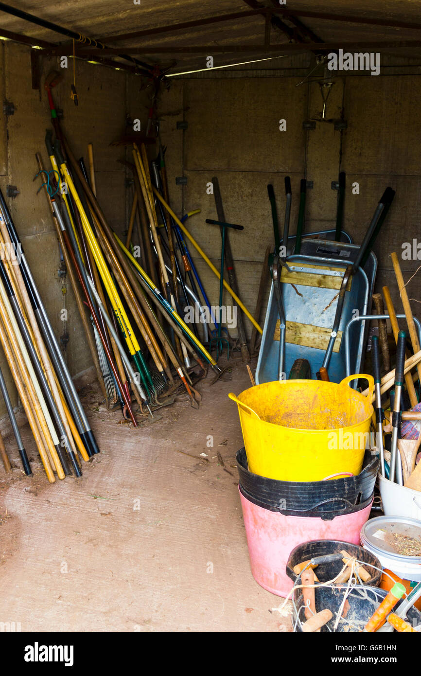 Interior of an allotment tool shed Stock Photo - Alamy