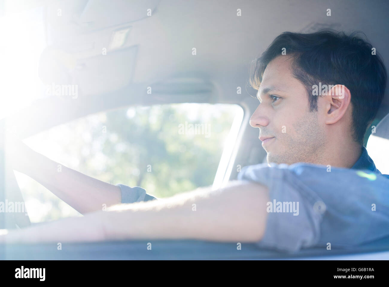 Man driving car Stock Photo - Alamy