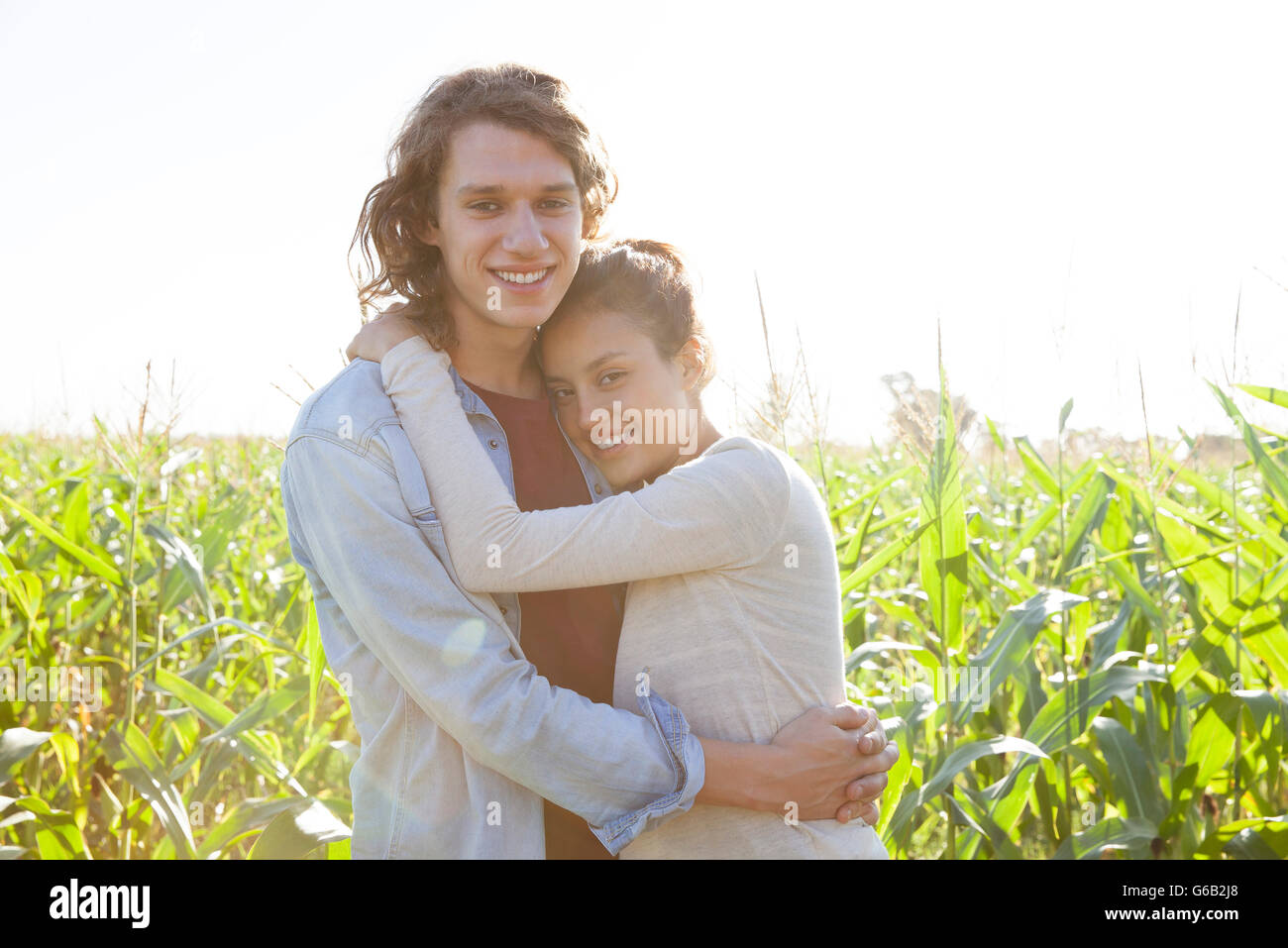 Young couple embracing, portrait Stock Photo - Alamy