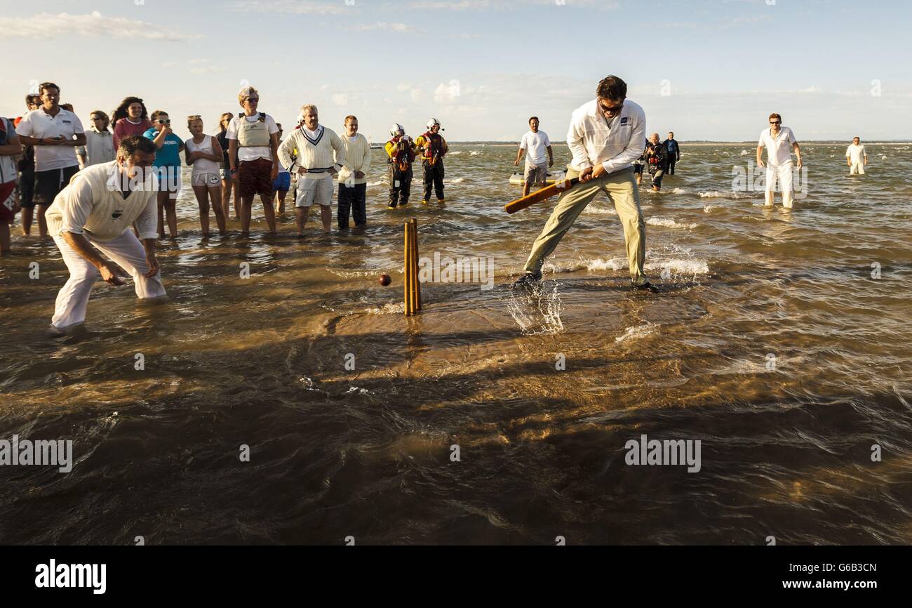 Action during the annual Bramble Bank cricket match which takes place ...