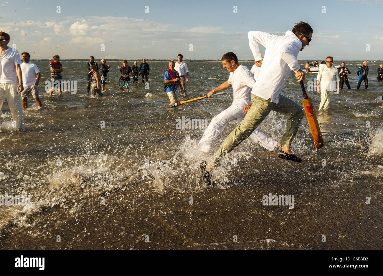 Annual bramble bank cricket match in the sea hi-res stock photography ...