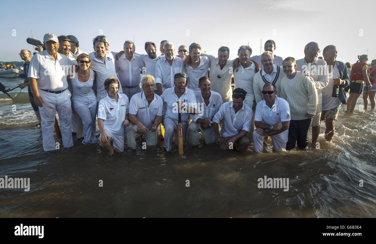 The teams line up for a commemorative photo after the annual Bramble ...