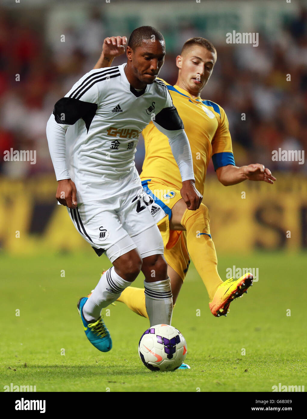 Swansea citys jonathan de guzman and petrolul ploiestis gheorghe grozav ...