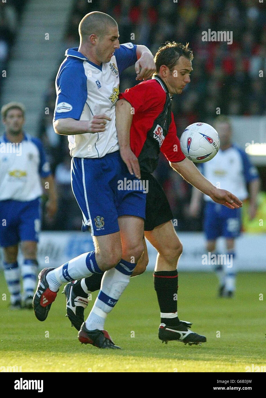 Bournemouth's James Hayter (right) tries to hold off the challenge of ...