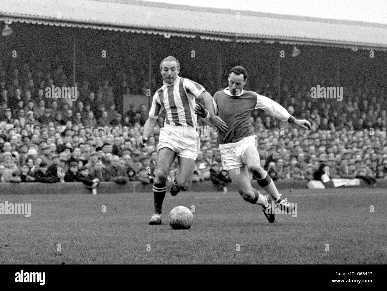 Now 49 years of age, soccer 'wizard' Stanley Matthews (left) in action ...