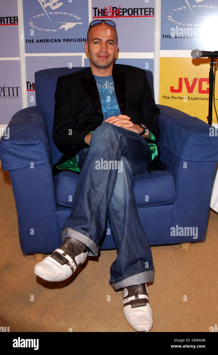 Celebrity actor sitting crossed legs sunglasses smiling billy zane hi ...