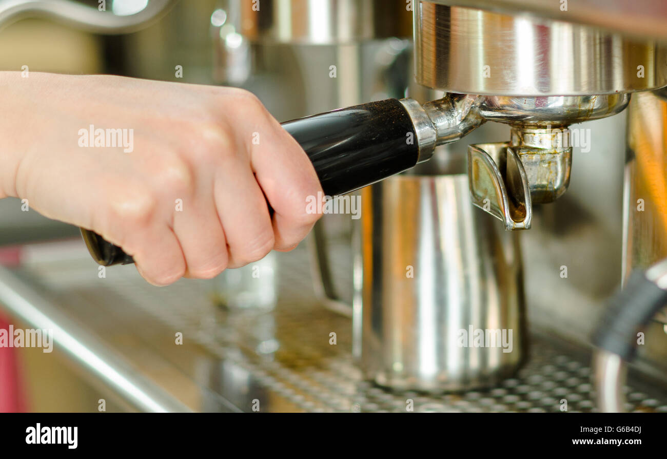 Inserting coffee espresso machine hi-res stock photography and images ...