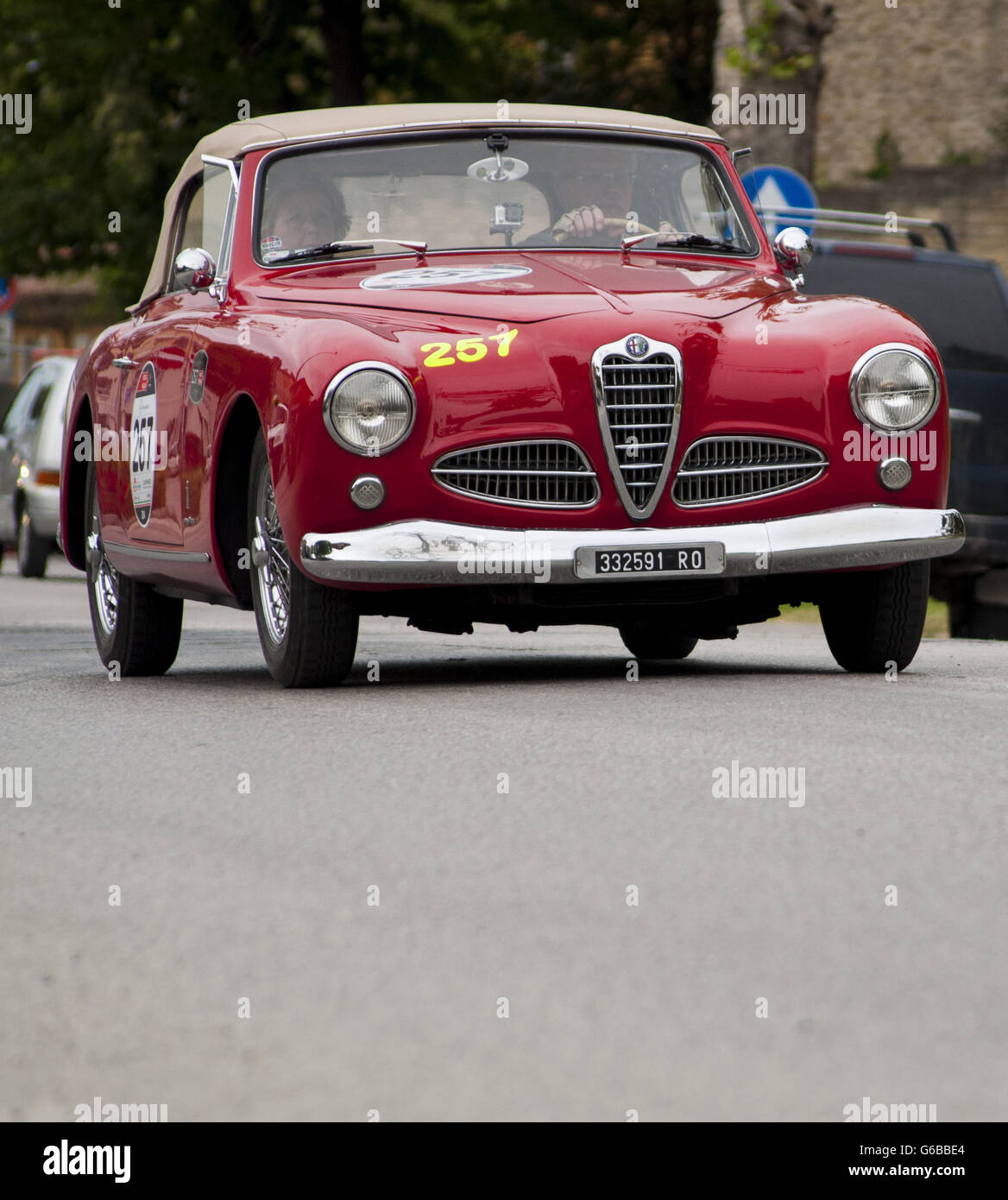 FANO, ITALY - MAY 16: unidentified crew on an old racing car in rally ...