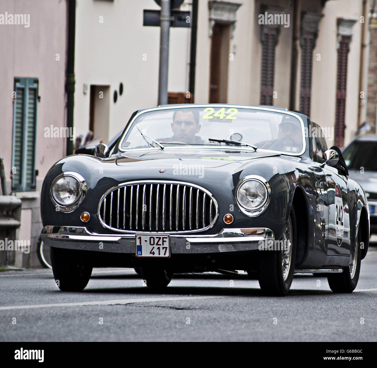 FANO, ITALY - MAY 16: unidentified crew on an old racing car in rally ...