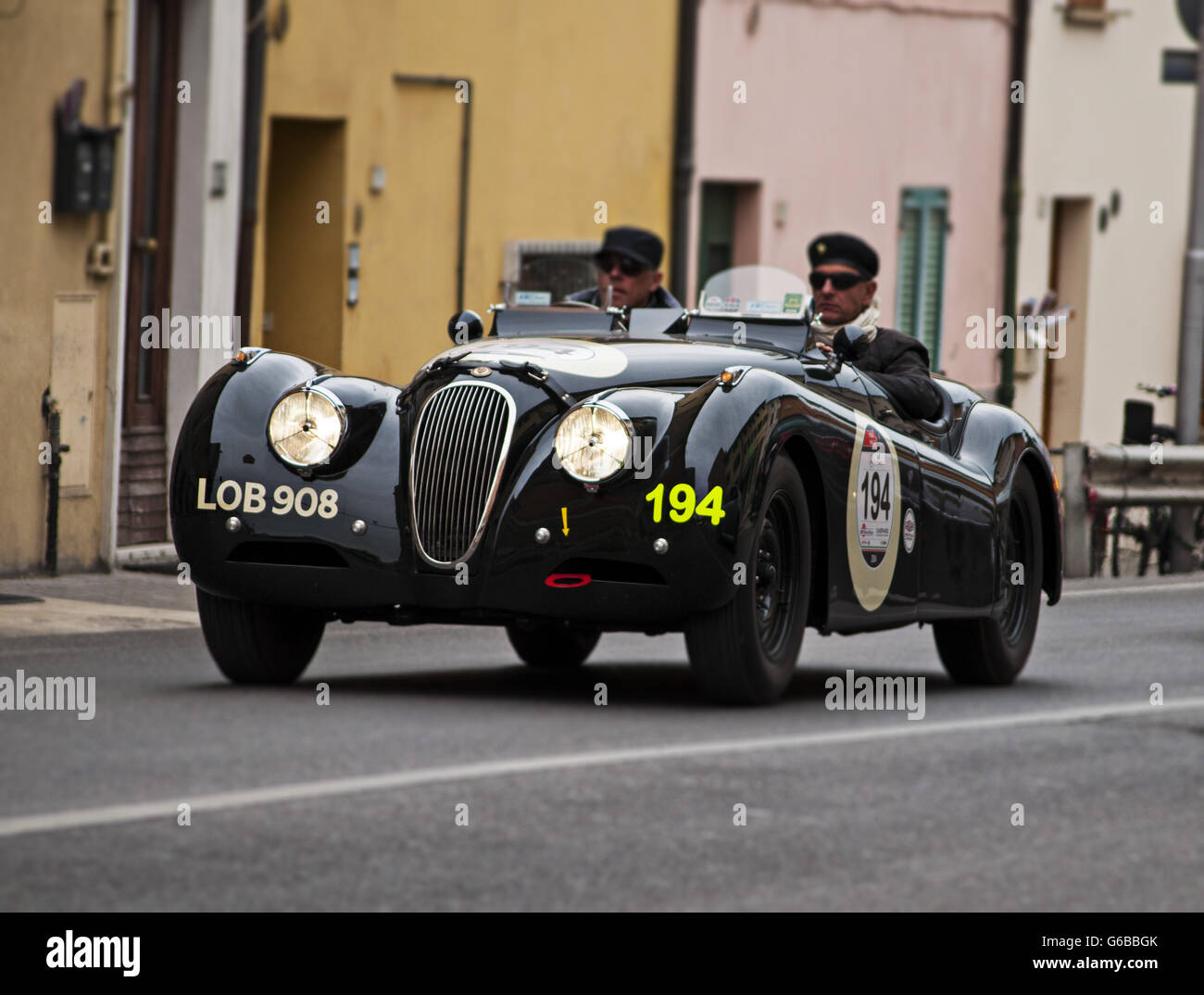 FANO, ITALY - MAY 16: unidentified crew on an old racing car in rally ...