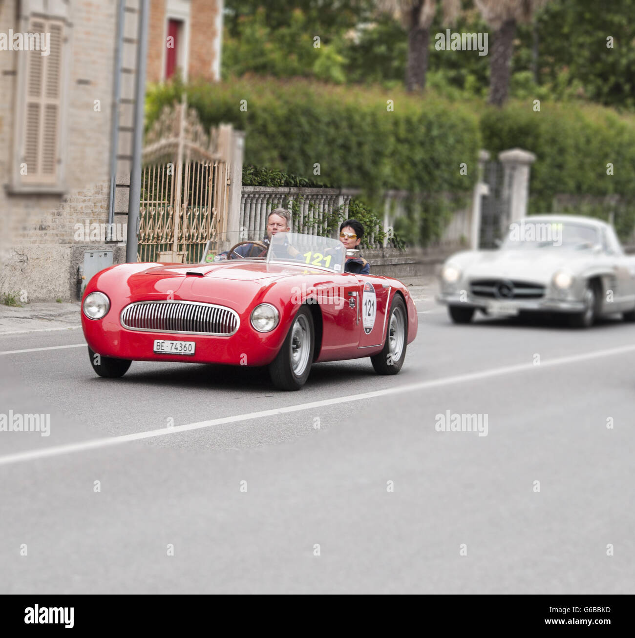 FANO, ITALY - MAY 16: unidentified crew on an old racing car in rally ...