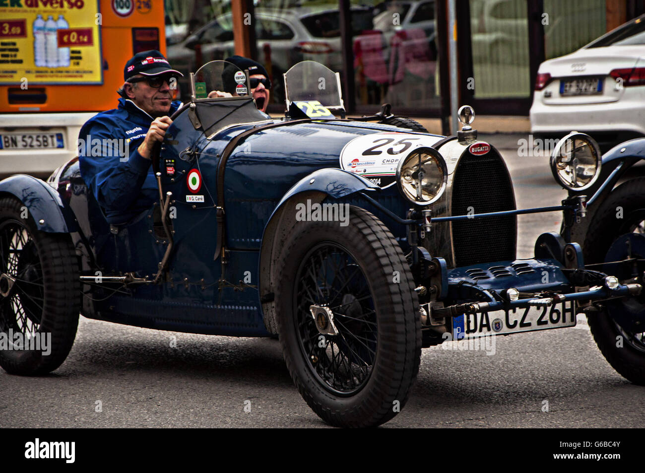 FANO, ITALY - MAY 16: unidentified crew on an old racing car in rally ...