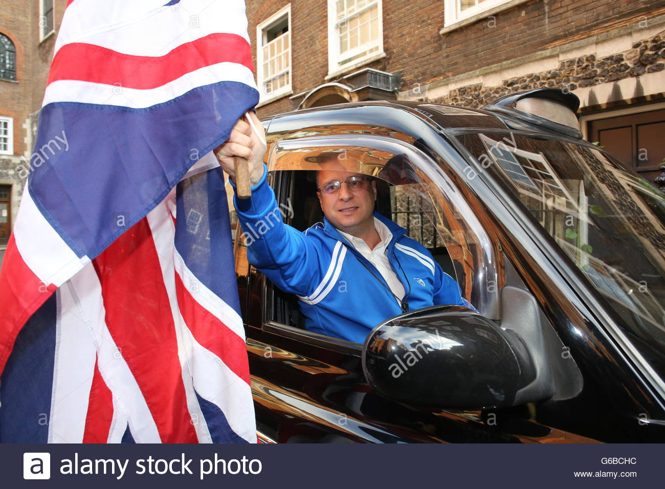 Taxi driver uk hi-res stock photography and images - Alamy
