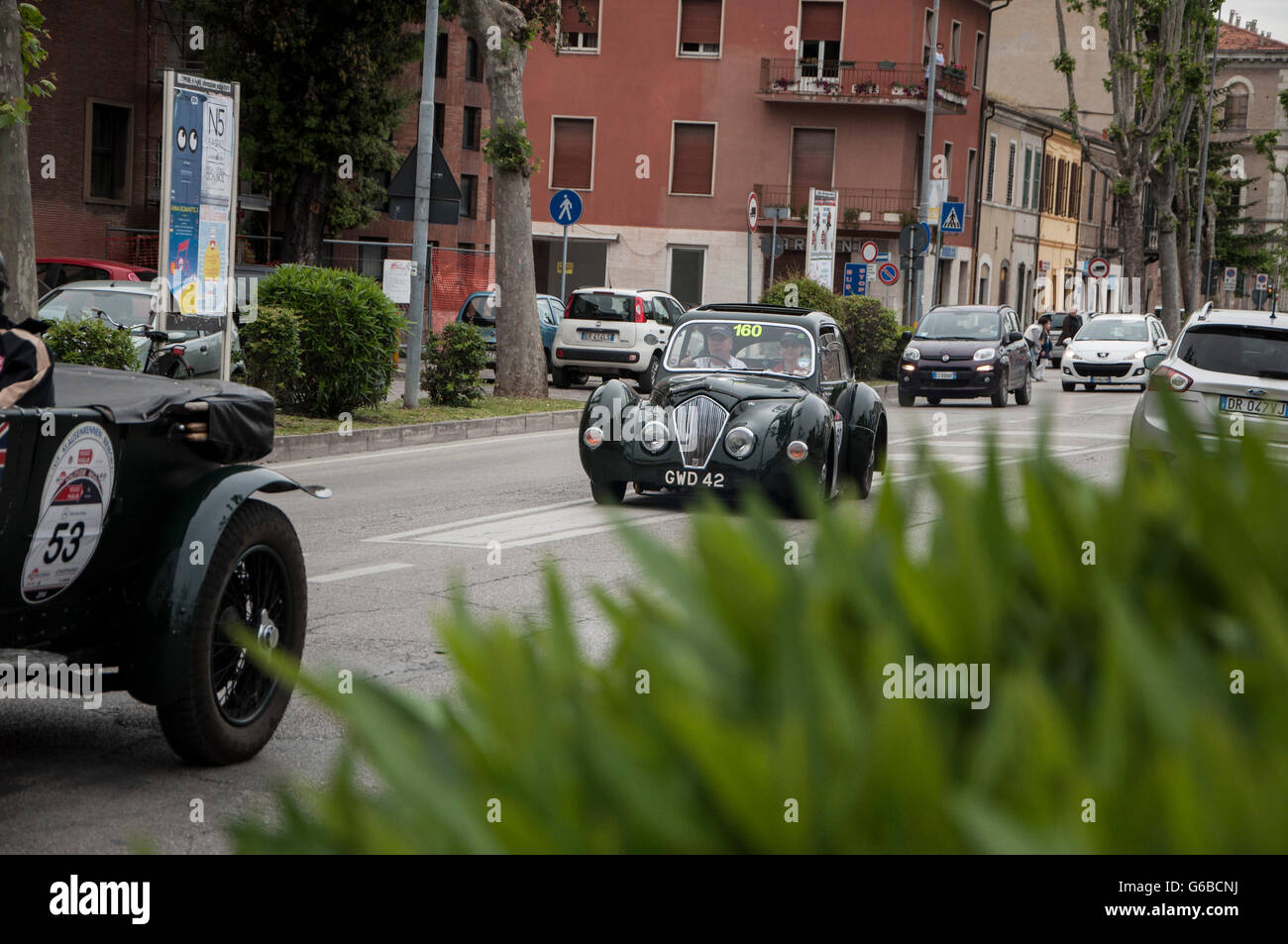 FANO, ITALY - MAY 16: unidentified crew on an old racing car in rally ...