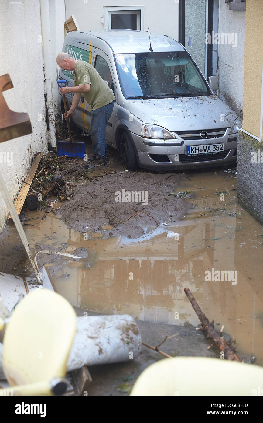 Resident cleaning mud hi-res stock photography and images - Alamy