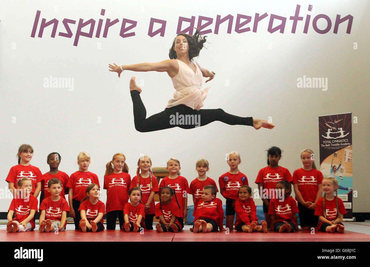 Beth Tweddle jumps above children from the Beth Tweddle Academy in ...