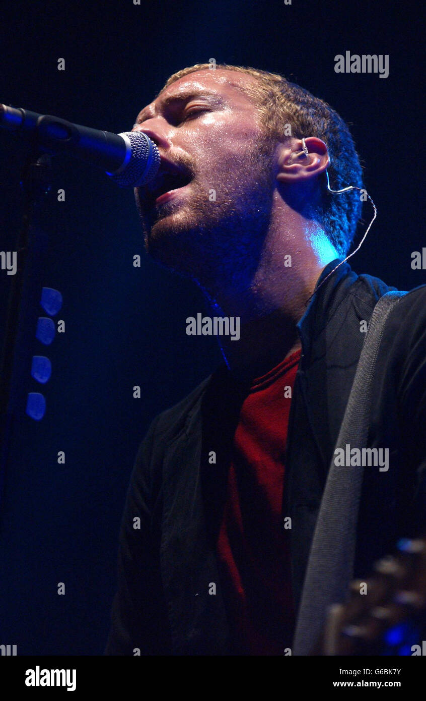 Lead singer of the pop band coldplay hi-res stock photography and ...