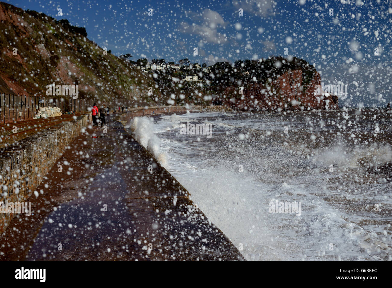 Sea spray from wave crashing against the sea wall Stock Photo - Alamy