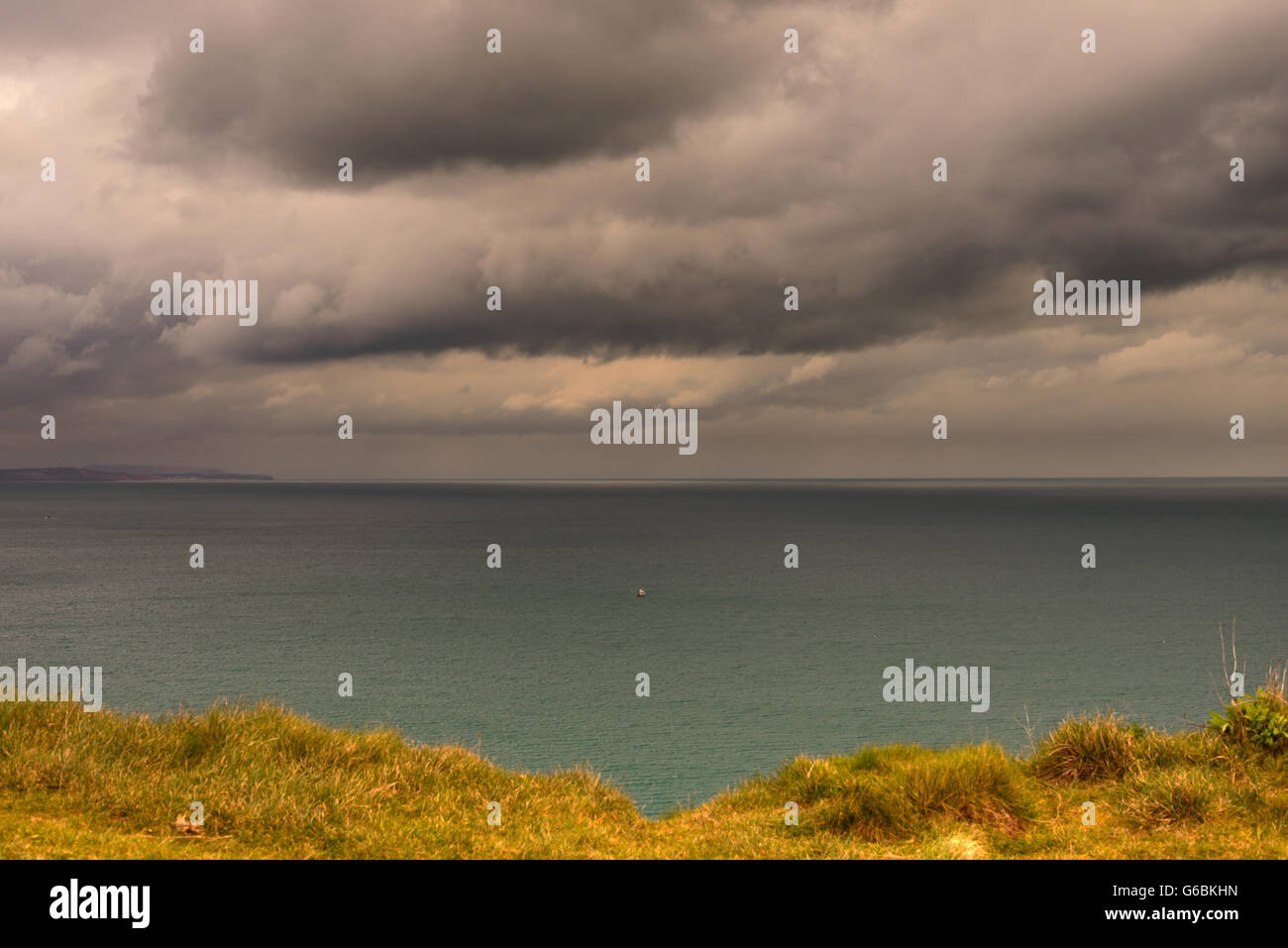 Rain clouds over the sea Stock Photo - Alamy