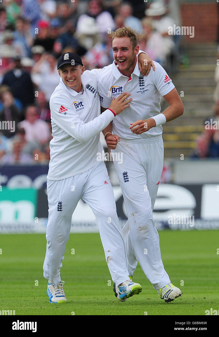 England's Stuart Broad celebrates with Joe Root (left) after taking the ...