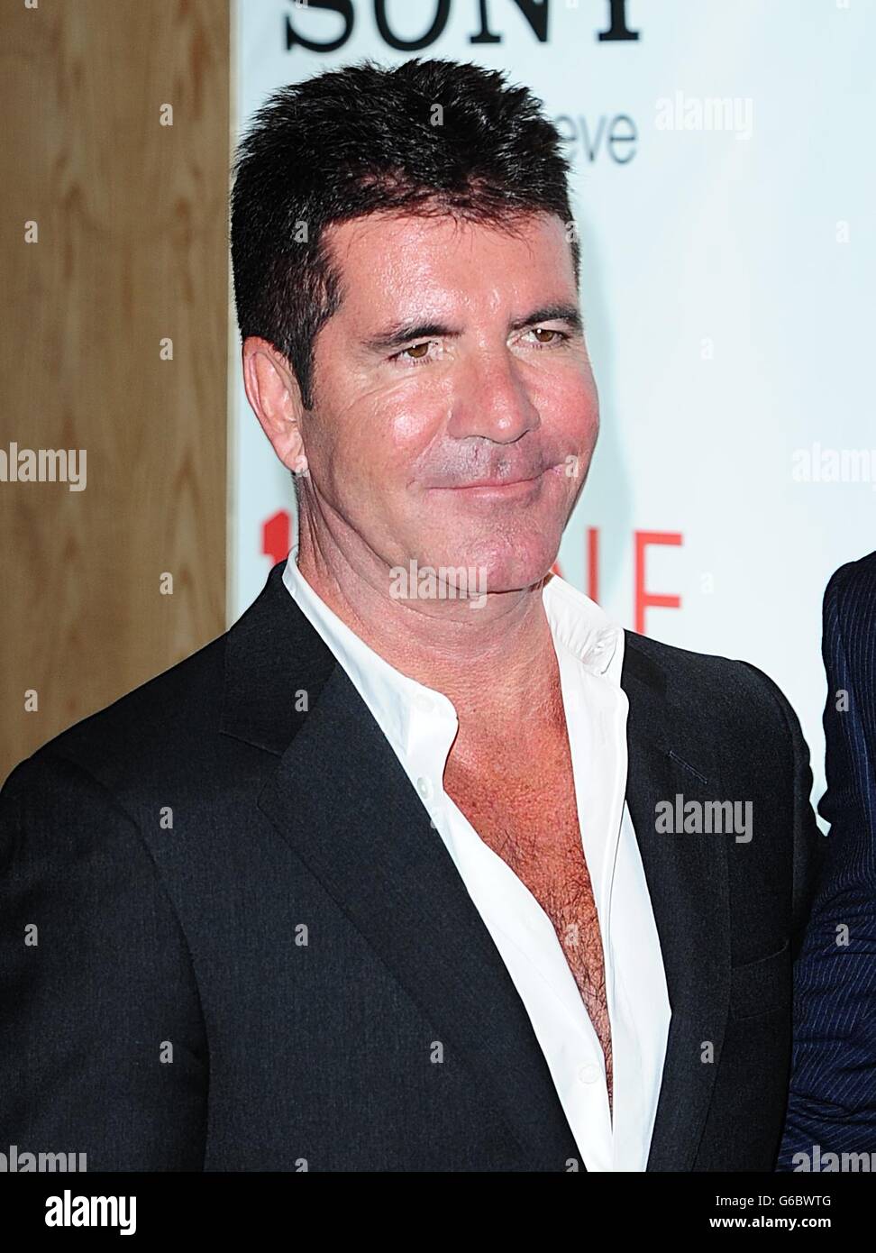 Simon Cowell at the World Premiere of One Direction: This Is Us, at the ...