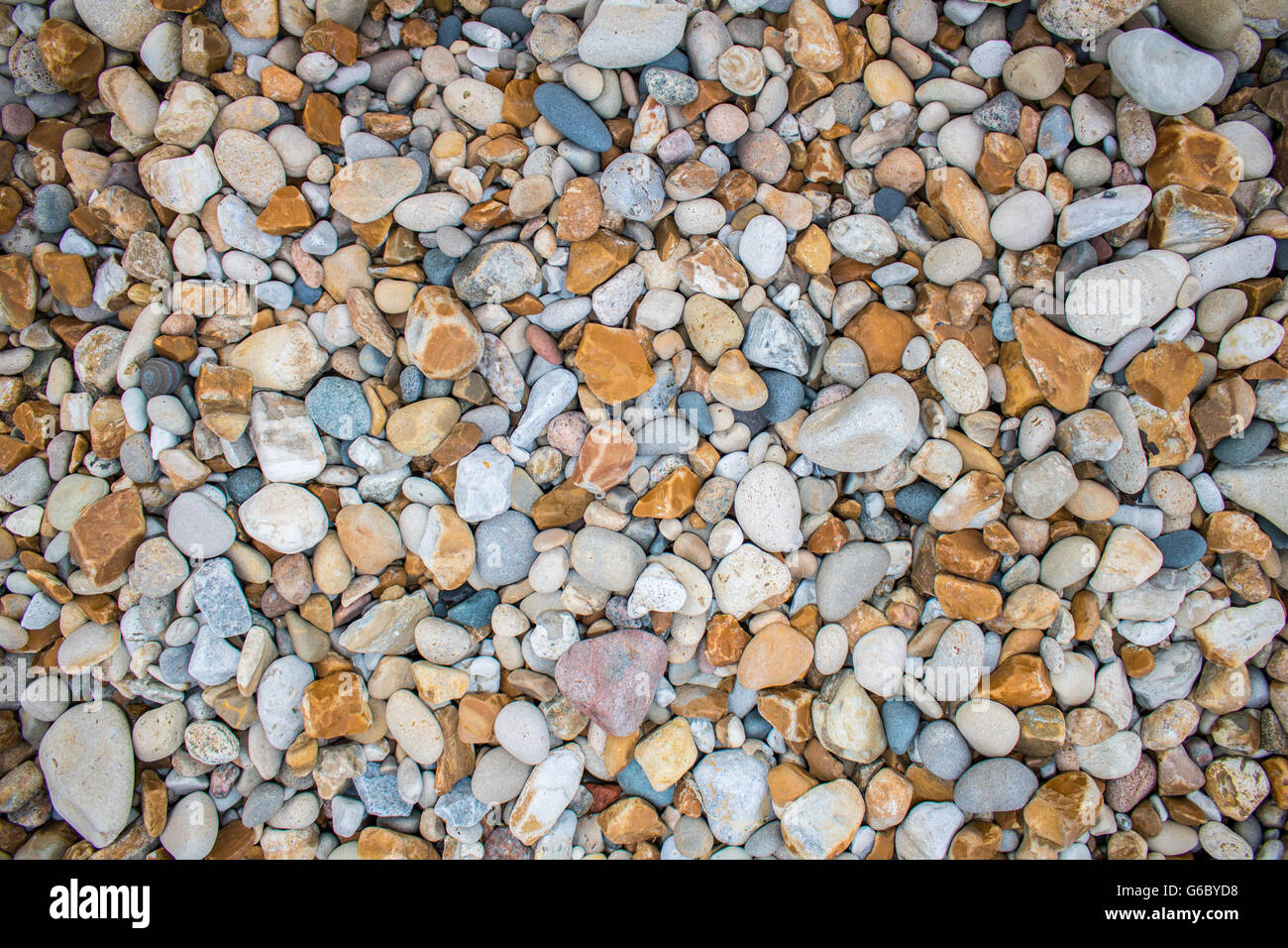 nice stones in the beach, colory nice stones background Stock Photo - Alamy