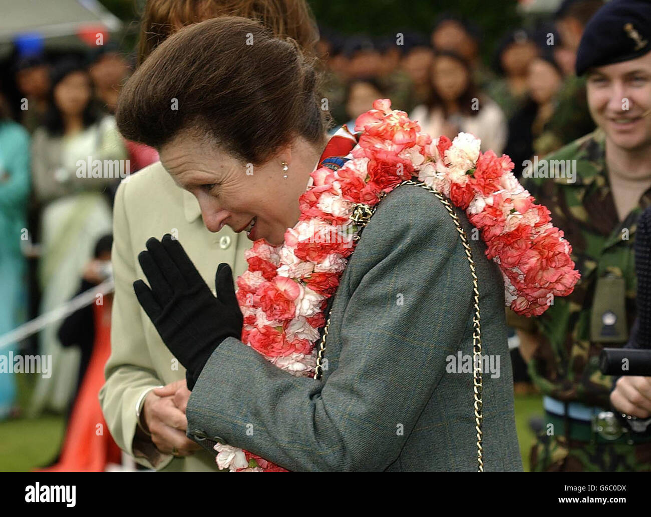 The Princess Royal uses the traditional Gurkha namaste greeting as she ...