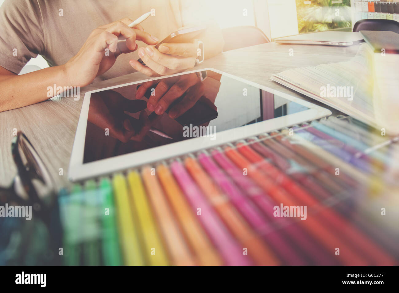Website designer working digital tablet and computer laptop with smart ...