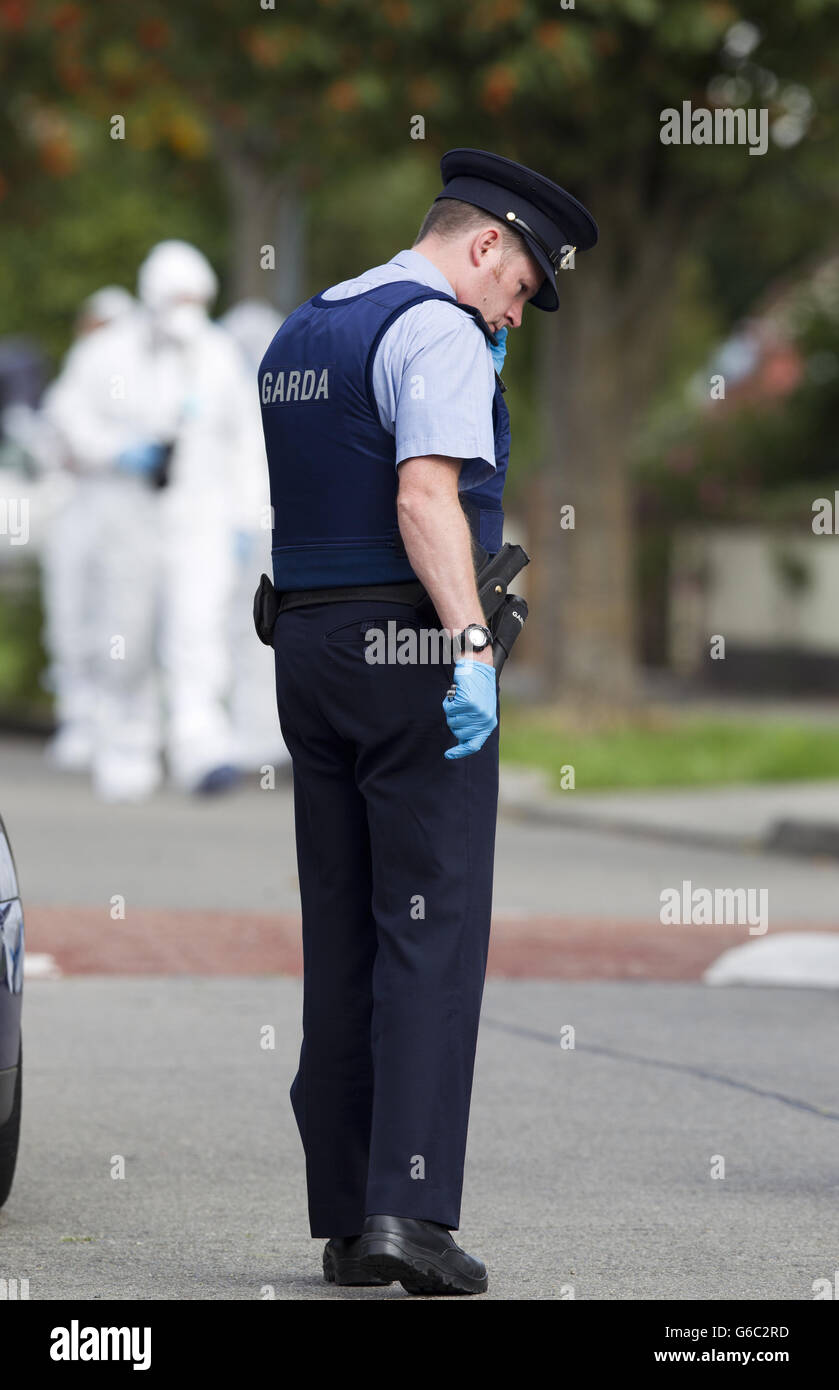Garda search the area on Cherrywood Drive, Clondalkin, Dublin, where a ...